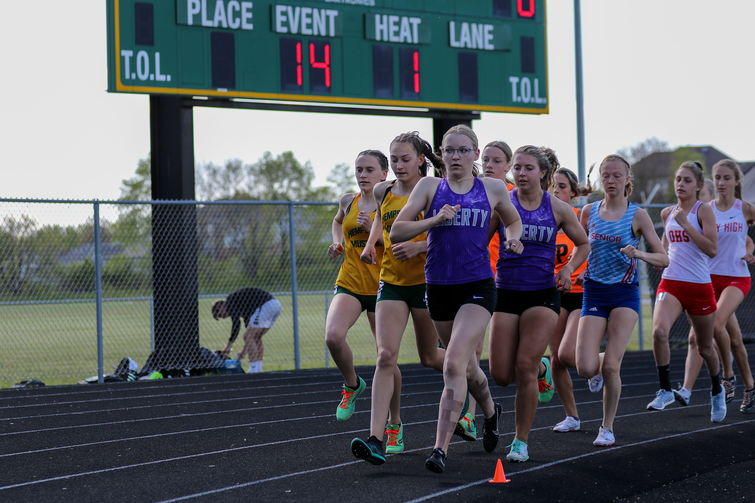 Keeney Helps Lift Liberty High to Share of State Qualifying Meet Team ...